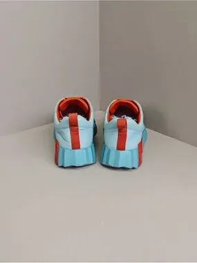 Hermes | Shoes | Hermes Light Blue Sneakers With Orange Accents | Poshmark